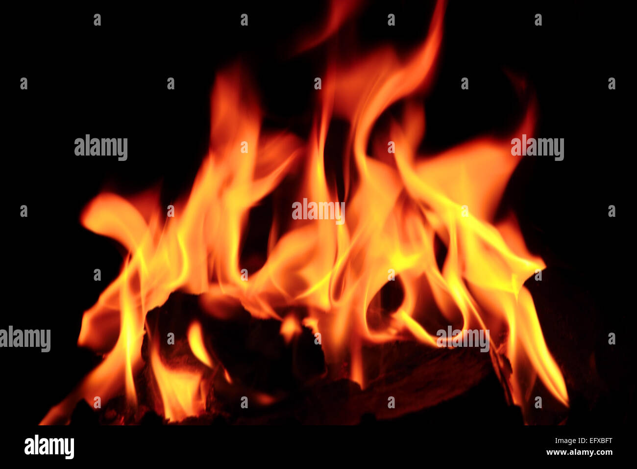 bright flames on an open fire that give that warm feeling Stock Photo ...