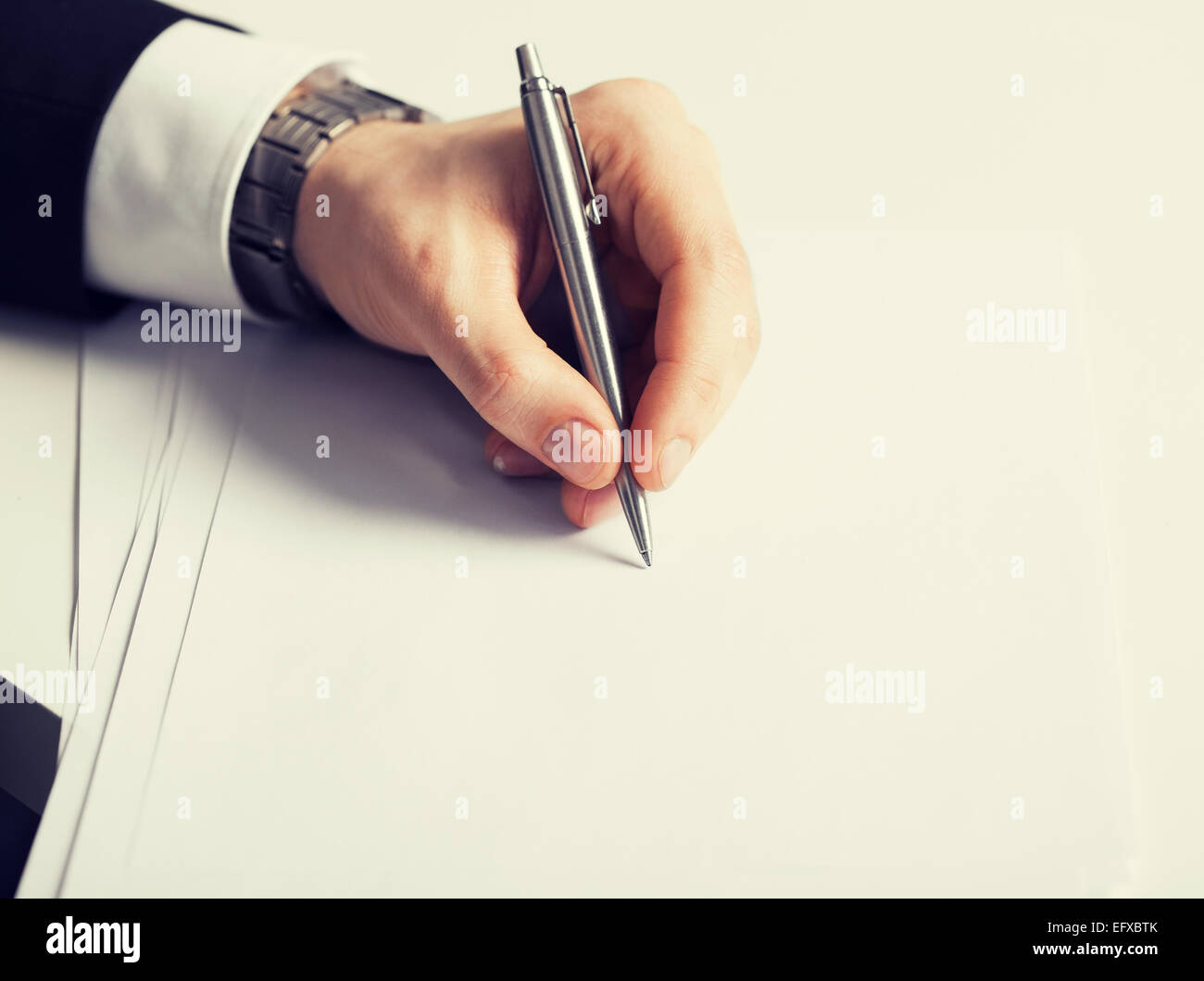 Man writing something ball hi-res stock photography and images - Alamy