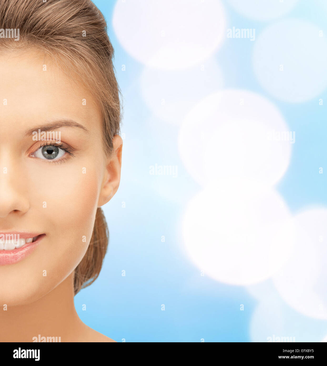 beautiful young woman half face Stock Photo - Alamy