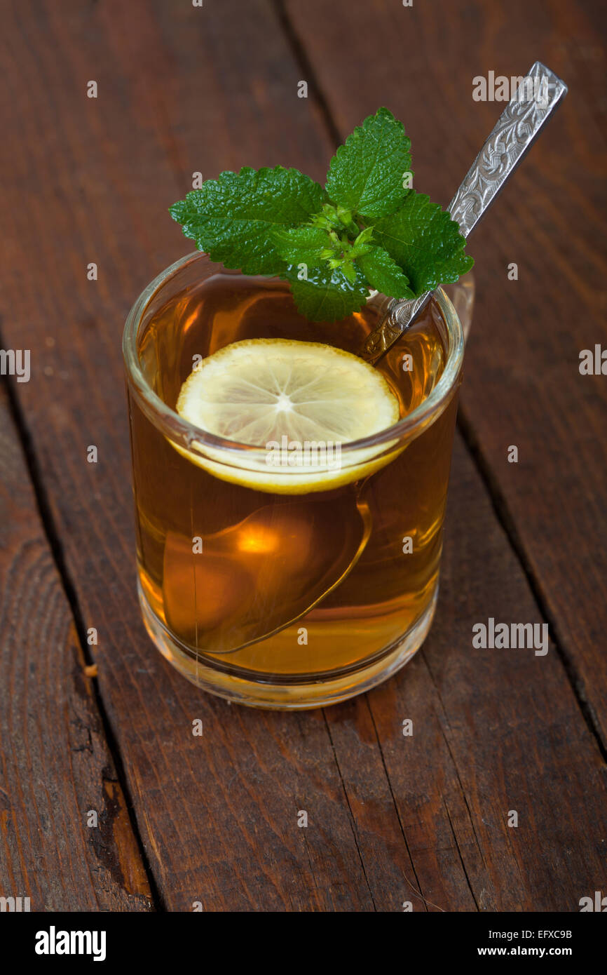 Tea cup with mint and lemon Stock Photo - Alamy