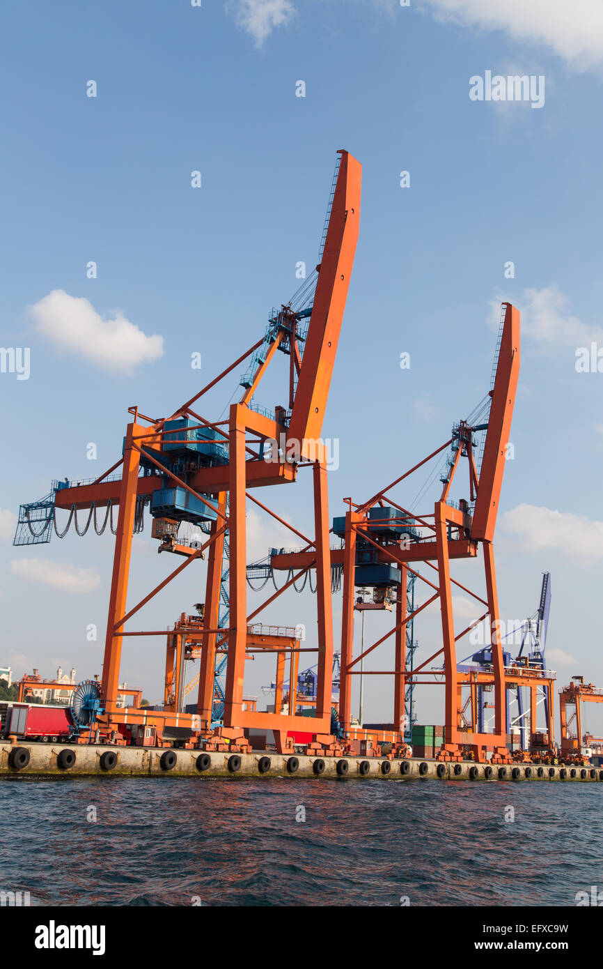 Orange Port Cranes in a Trading Port Stock Photo - Alamy