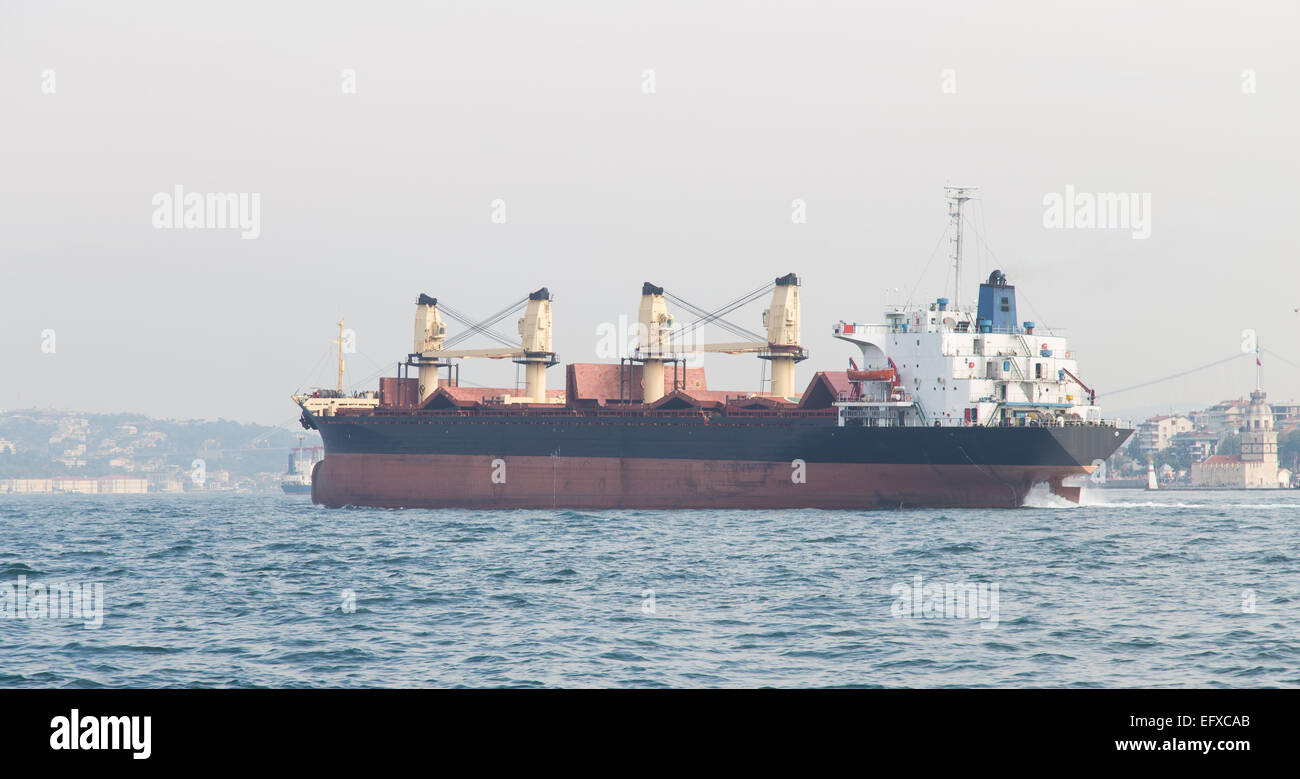 A cargo ship carrying goods between ports Stock Photo - Alamy
