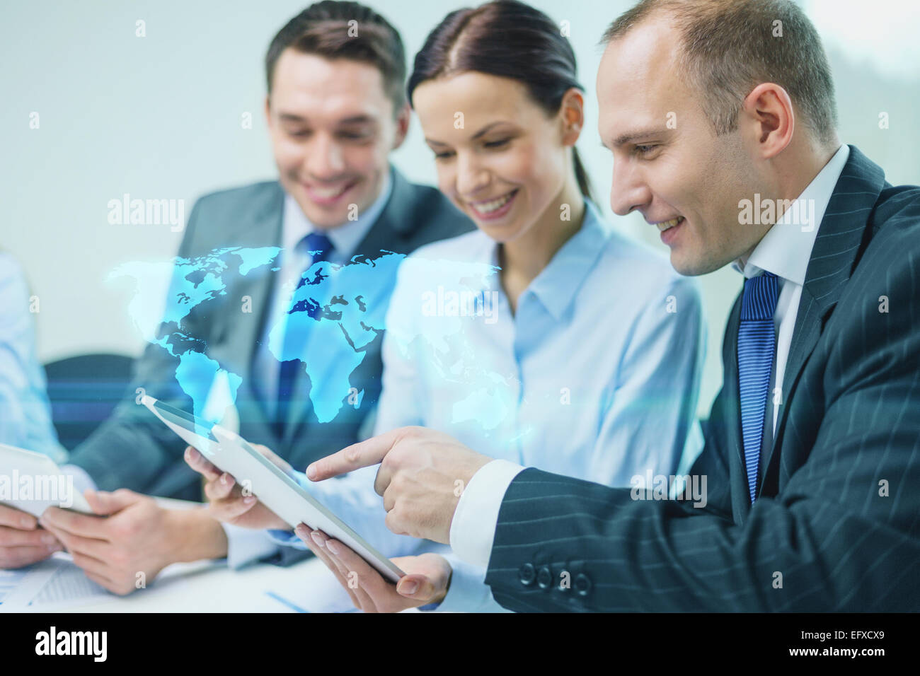 Business people discussing world map hi-res stock photography and ...