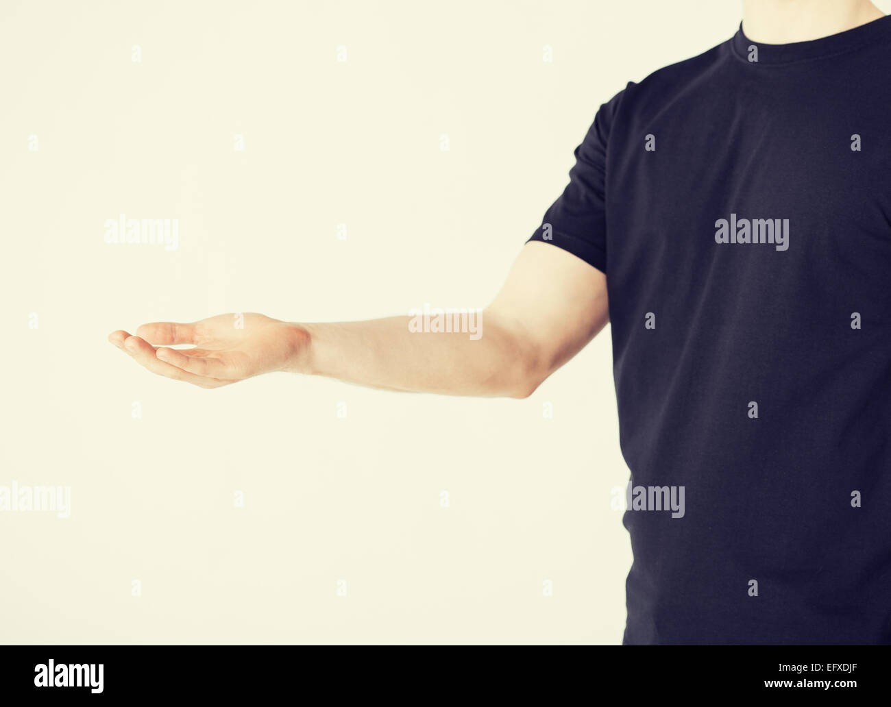 mans hands showing something Stock Photo - Alamy