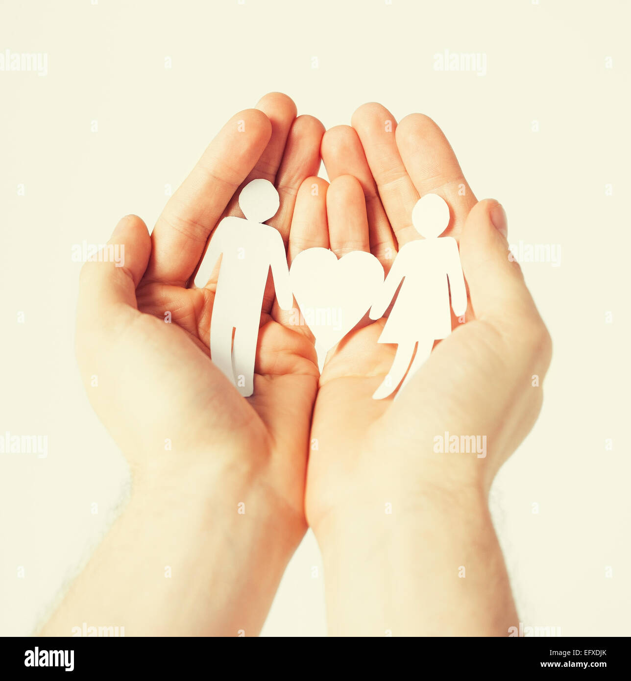 man hands with paper men Stock Photo - Alamy
