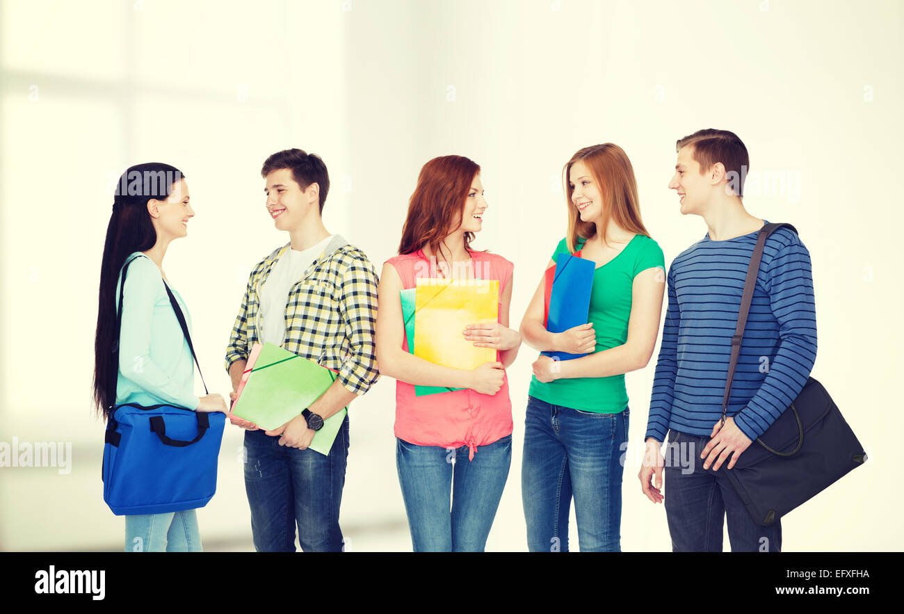 group of smiling students standing Stock Photo - Alamy