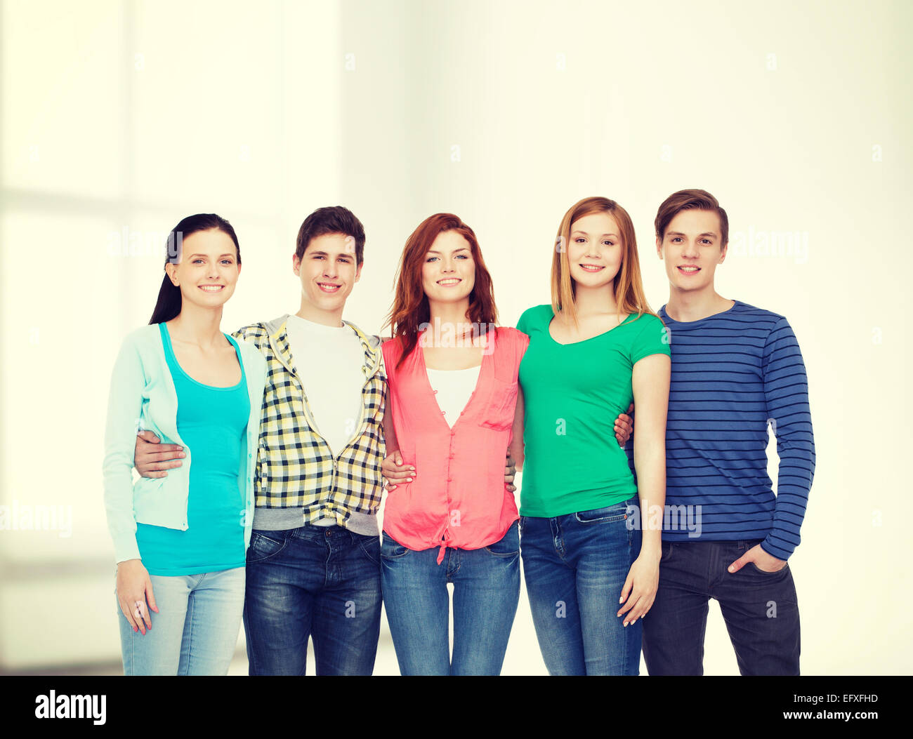 group of smiling students standing Stock Photo - Alamy
