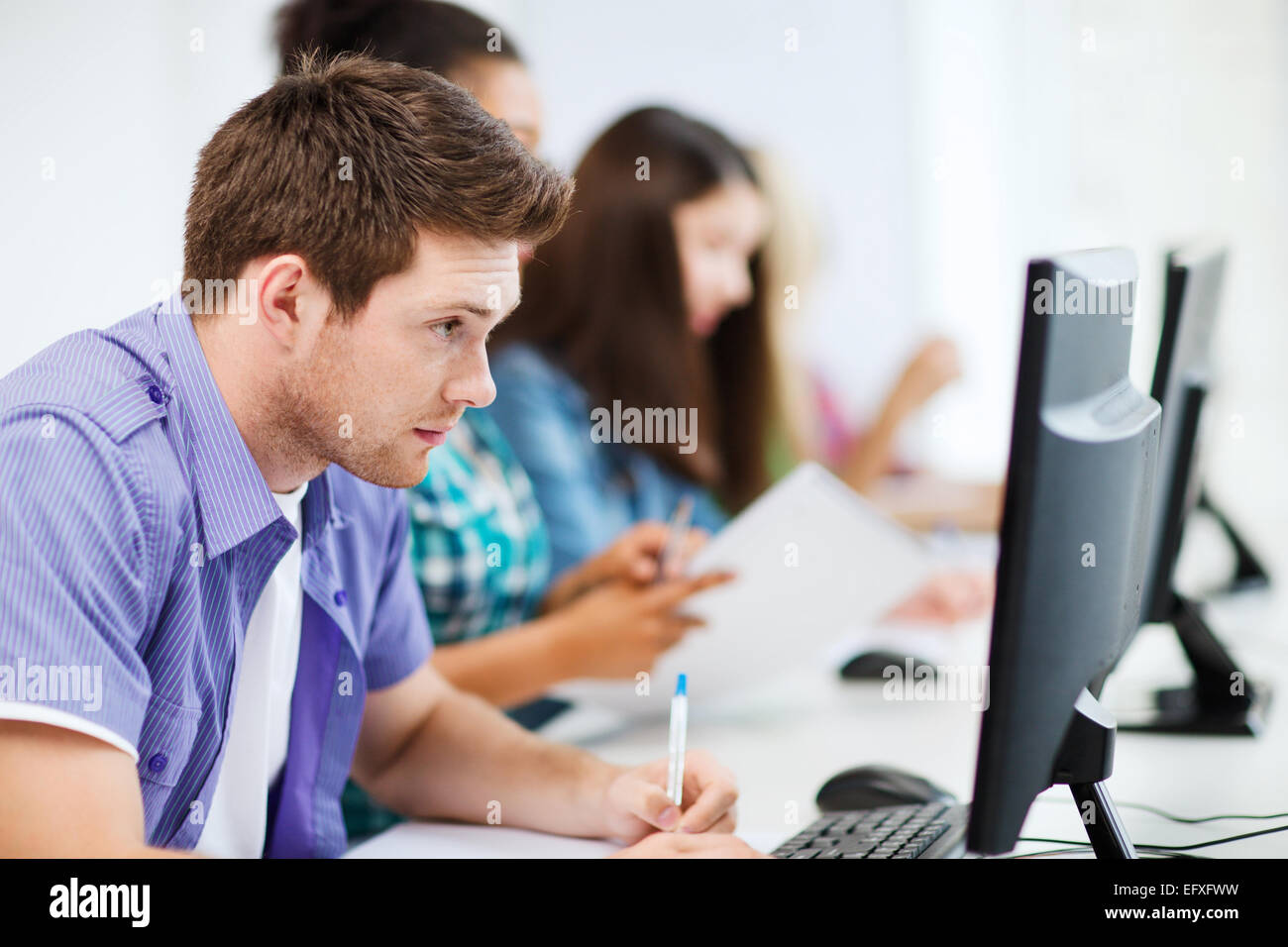 student with computer studying at school Stock Photo - Alamy