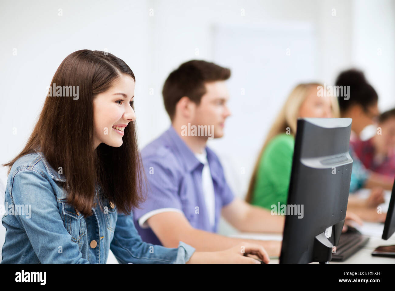 students with computers studying at school Stock Photo - Alamy