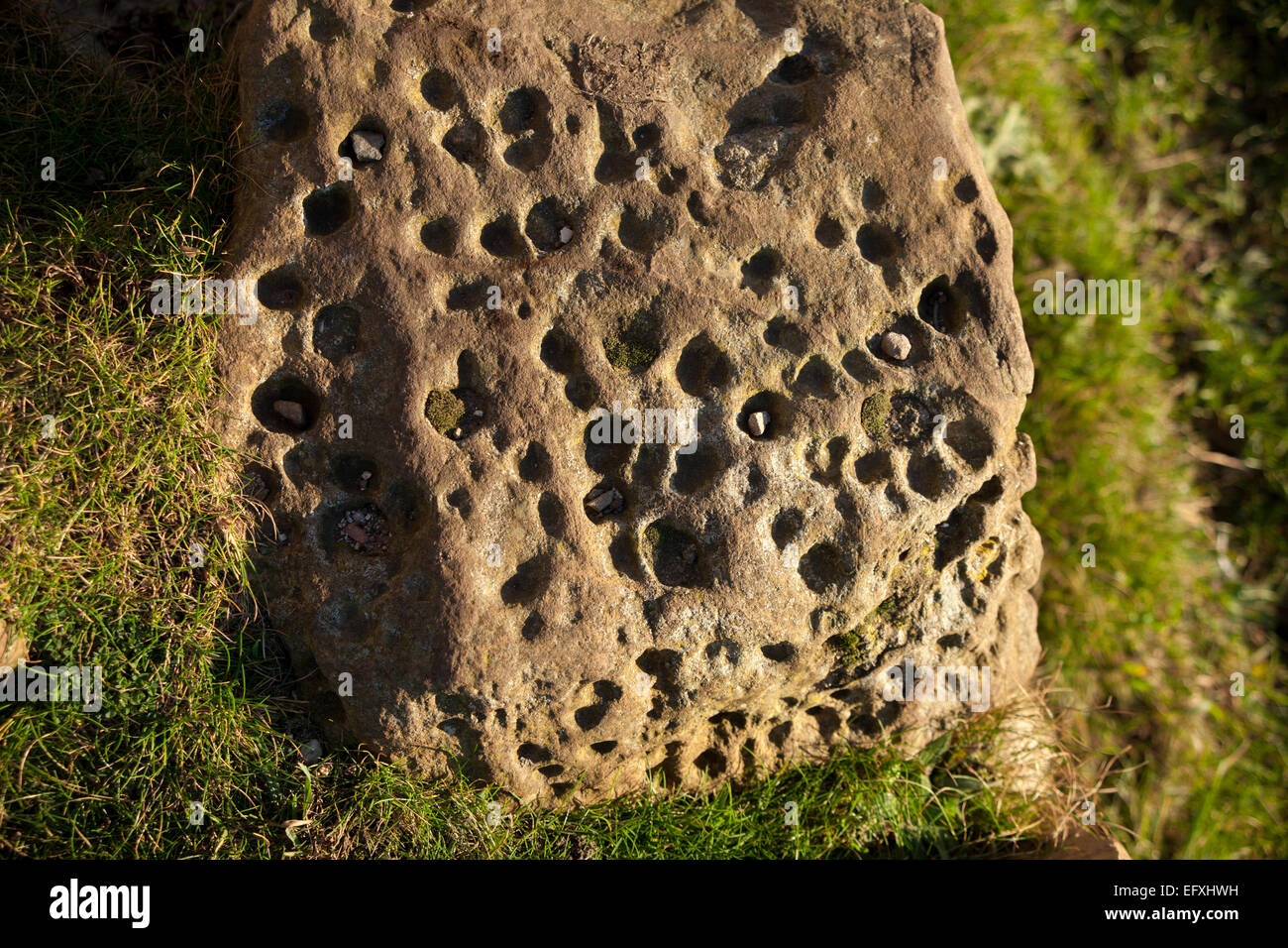 Stone background with holes Stock Photo - Alamy