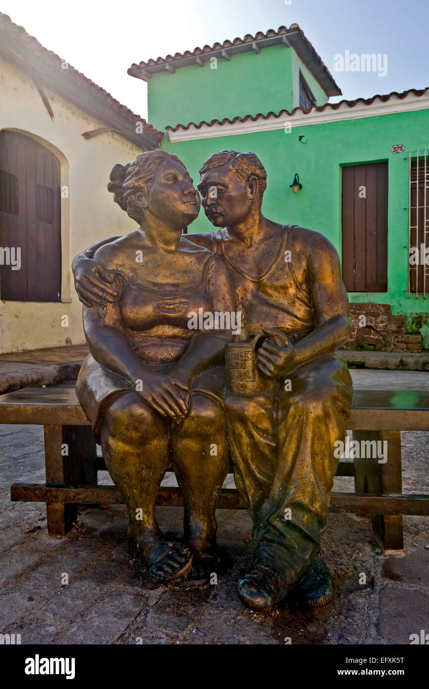Vertical close up of lifelike comical bronze statues in Camaguey, Cuba ...