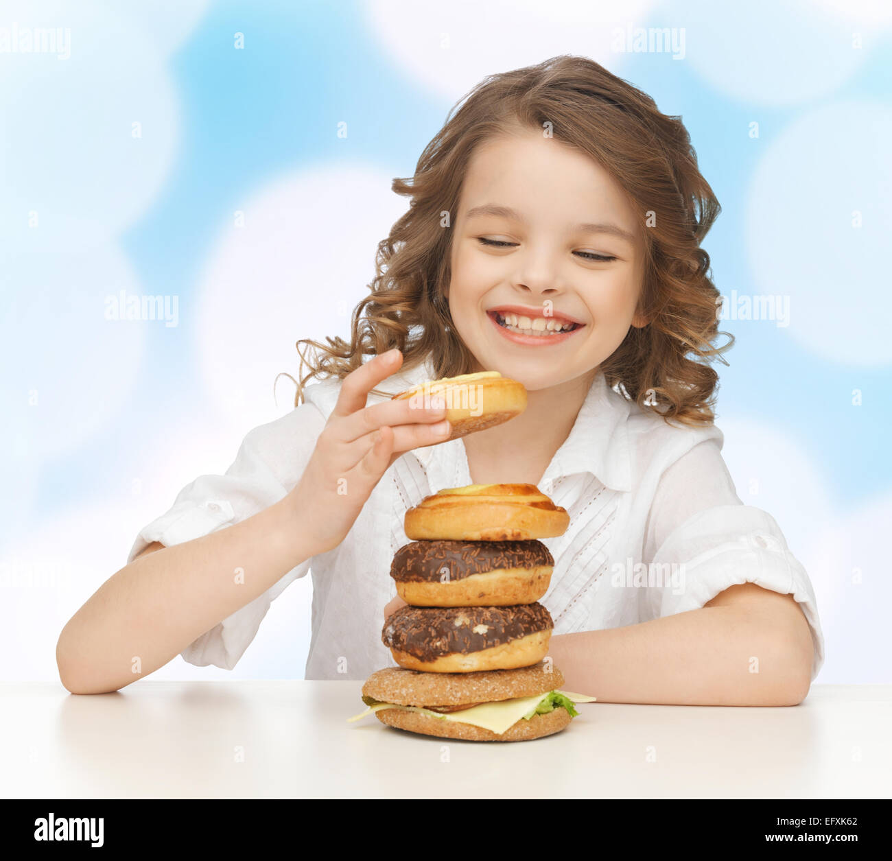 happy smiling girl with junk food Stock Photo - Alamy