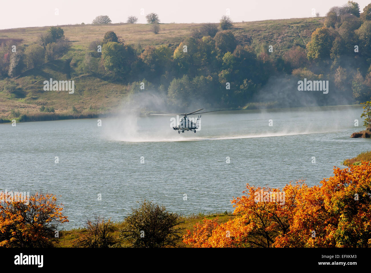 Military helicopter flying over forest hi-res stock photography and ...