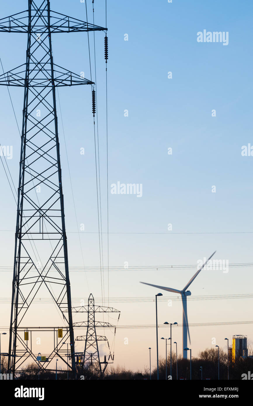 Silhouettes of UK energy infrastructure including cabling, pylons ...