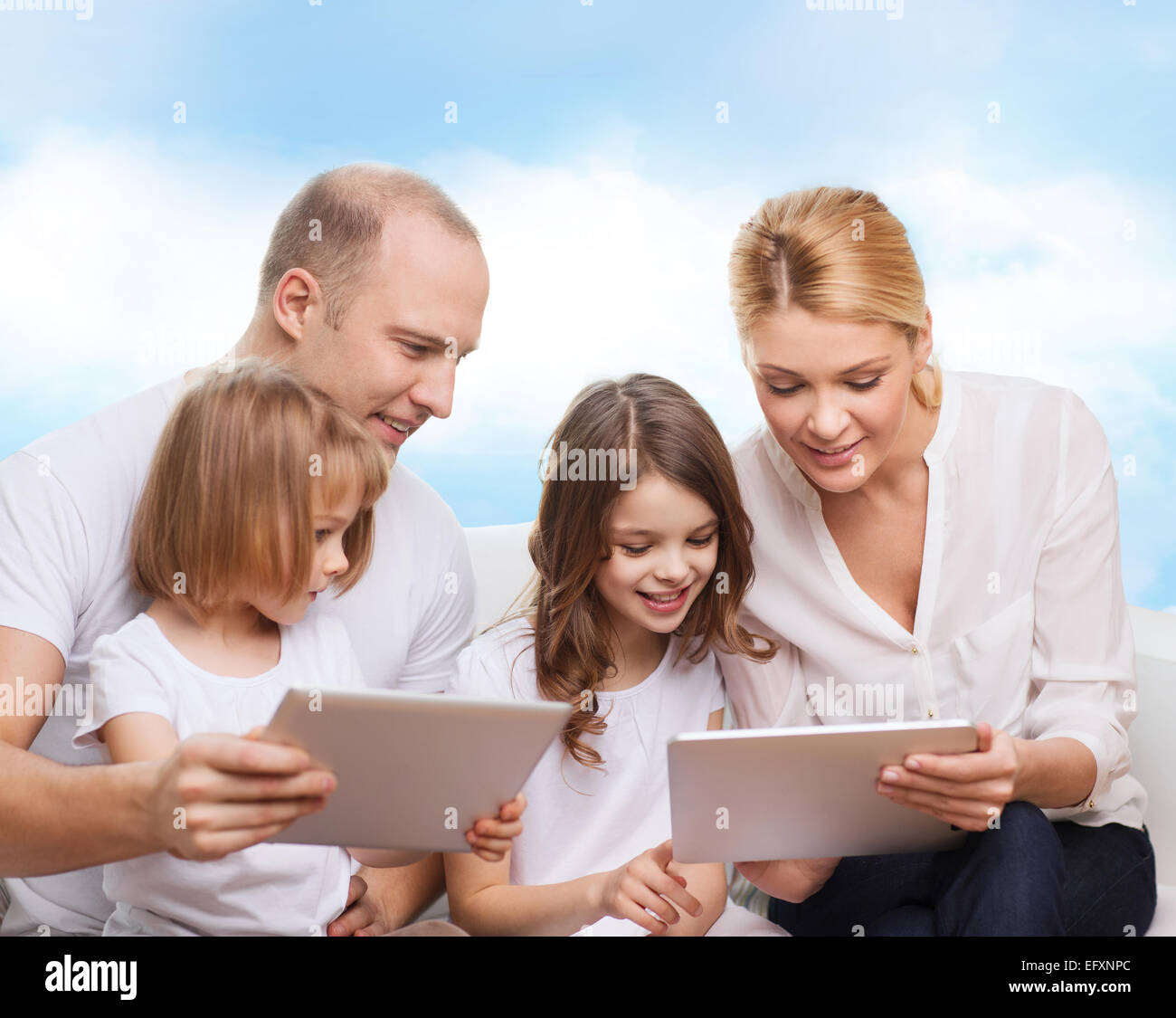 happy family with tablet pc computers Stock Photo - Alamy