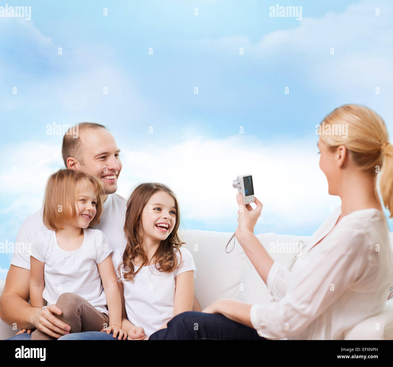happy family with camera at home Stock Photo - Alamy