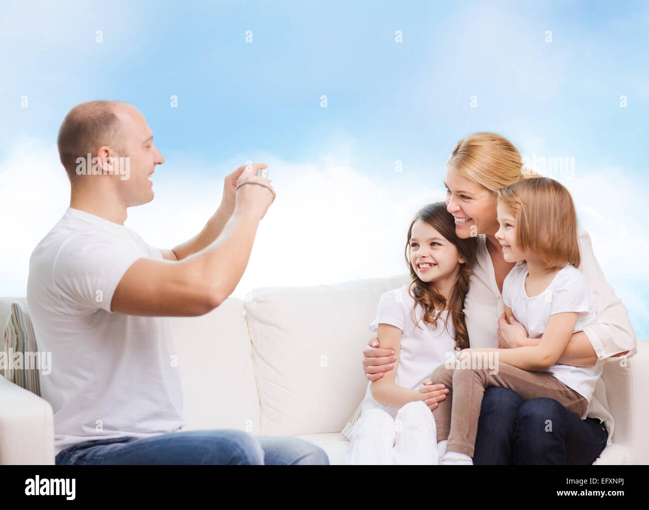 happy family with camera at home Stock Photo - Alamy