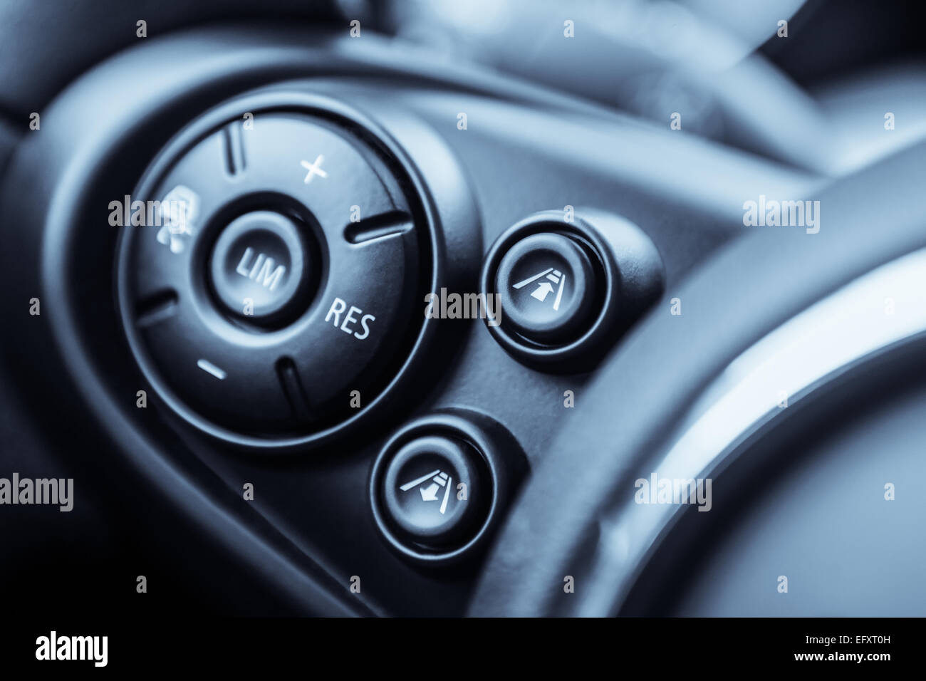 Shot of the cruise control button on a steering wheel Stock Photo - Alamy