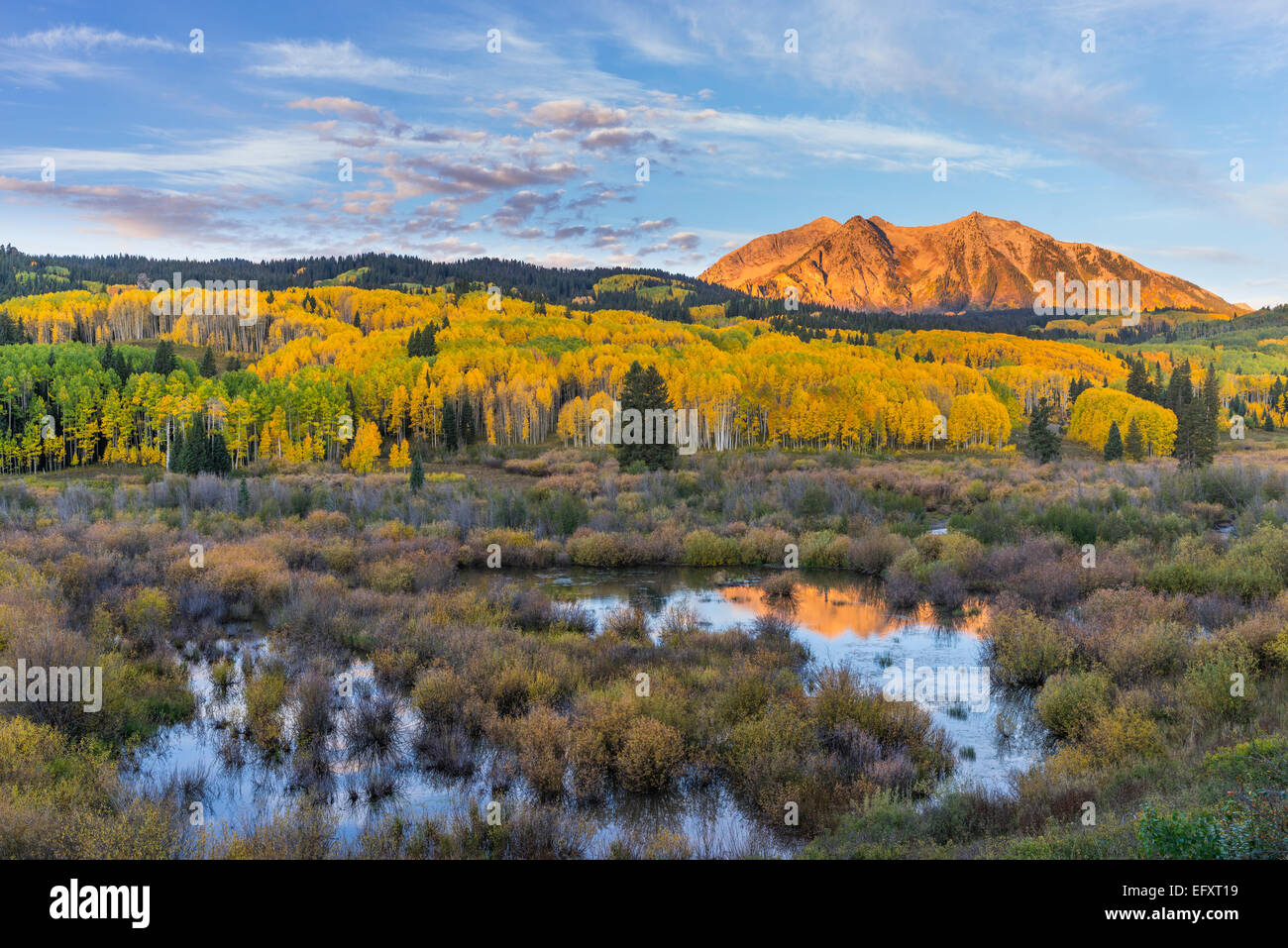 Gunnison National Forest, West Elk Mountains, CO: Sunrise light on East ...
