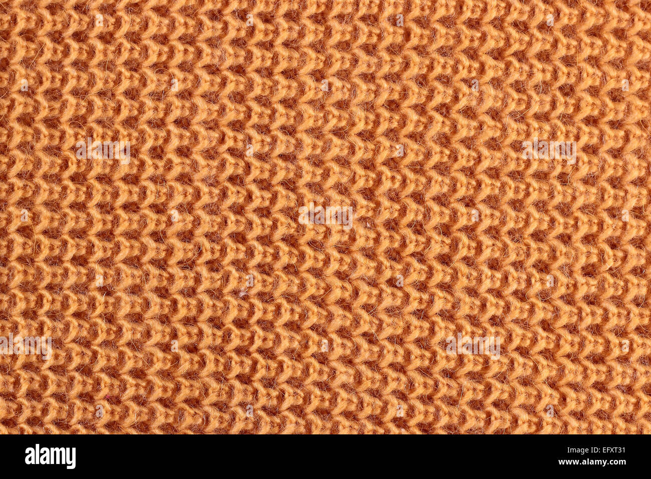 Orange texture of a knitted sweater for a background Stock Photo - Alamy