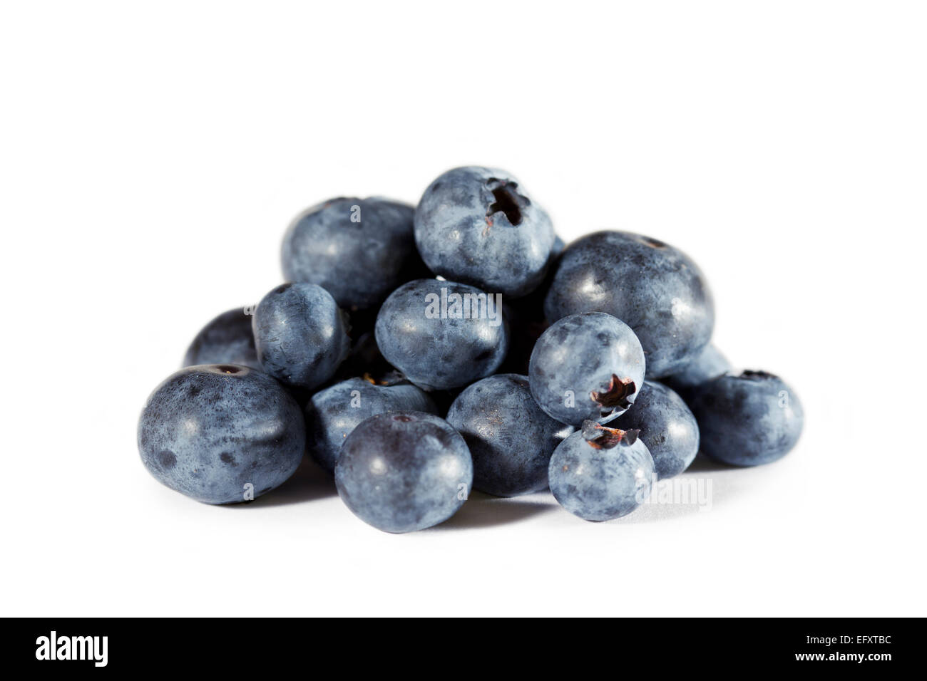 A pile of fresh organic blue berry. Side view on white background Stock ...