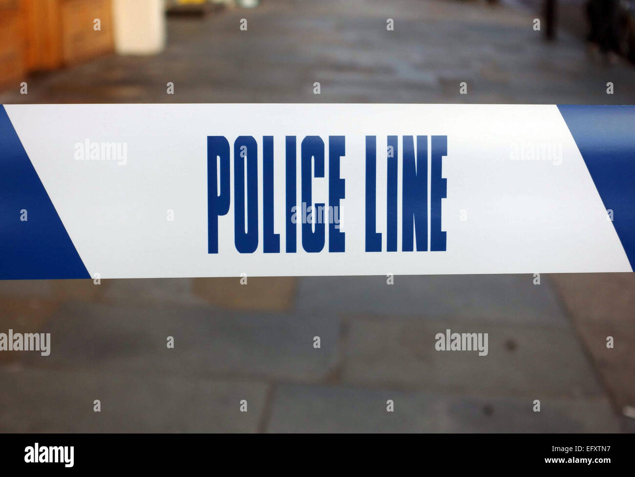 Crime scene in London street taped off by investigating police Stock ...