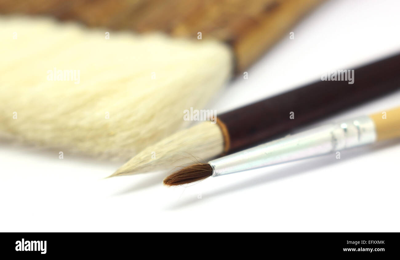 paintbrush and asian writing brush isolated on white background Stock ...
