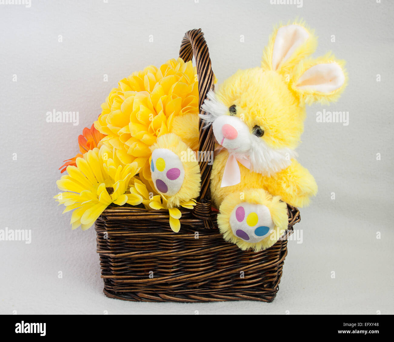 Easter bunny in basket hi-res stock photography and images - Alamy