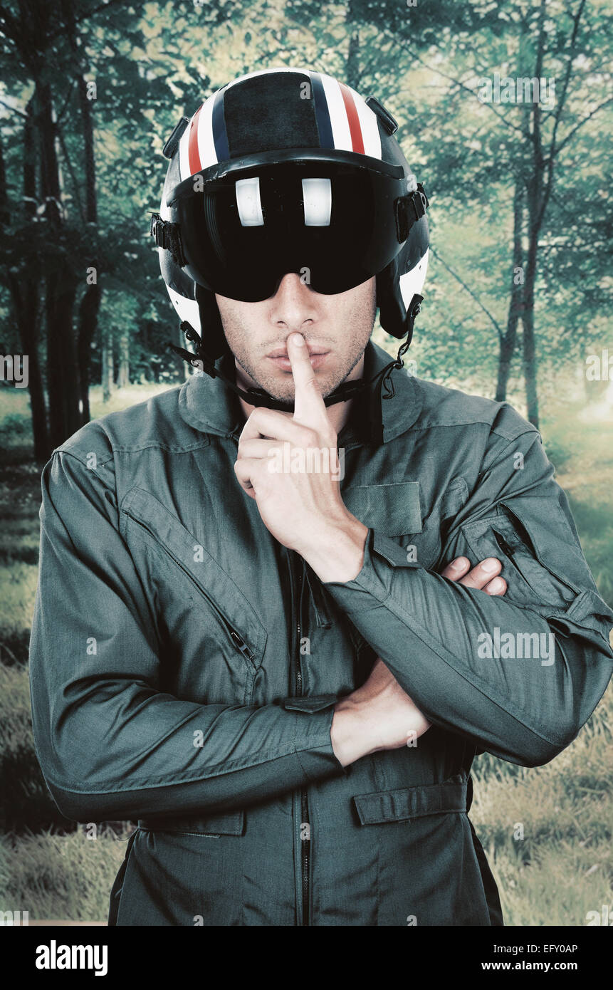 young handsome male pilot wearing uniform and helmet Stock Photo - Alamy
