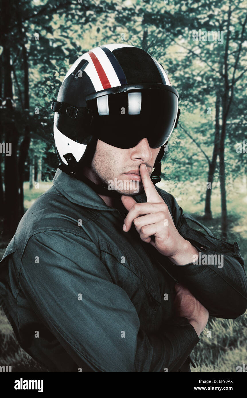 young handsome male pilot wearing uniform and helmet Stock Photo - Alamy