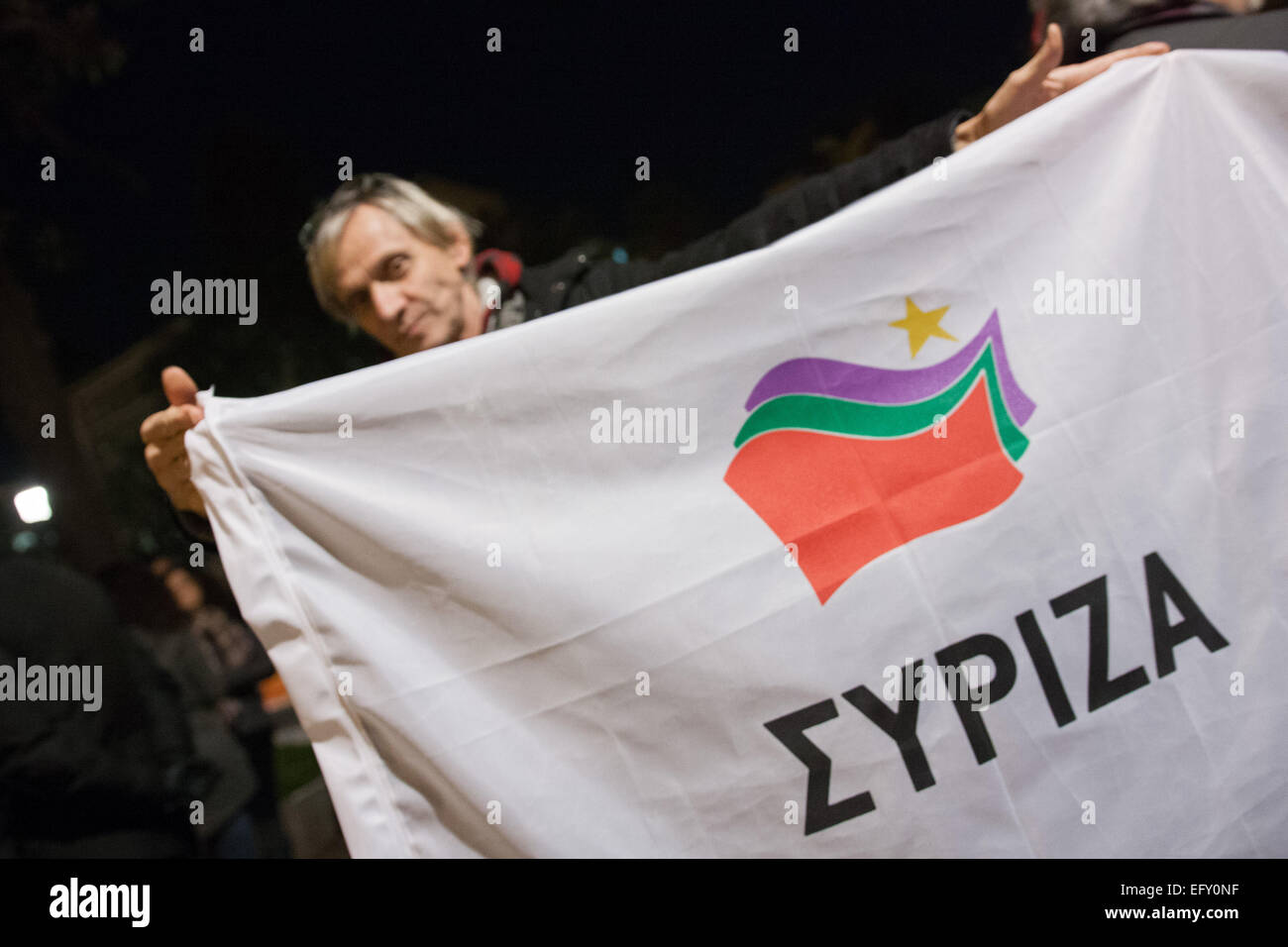 The flag of Syriza. Demonstration of solidarity with the Greek, before ...