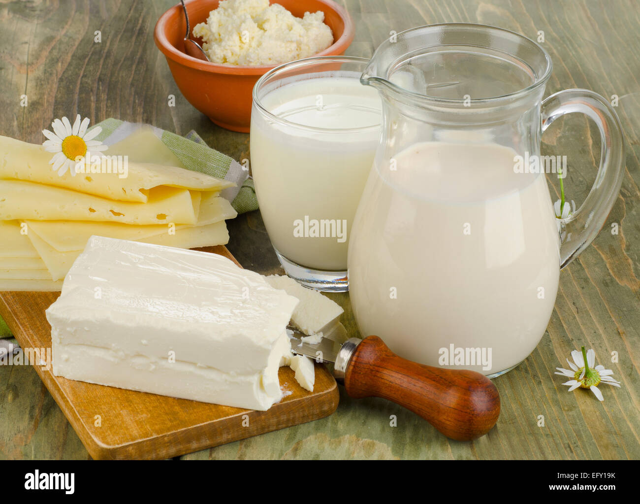 Fresh milk products on wooden table. Selective focus Stock Photo - Alamy