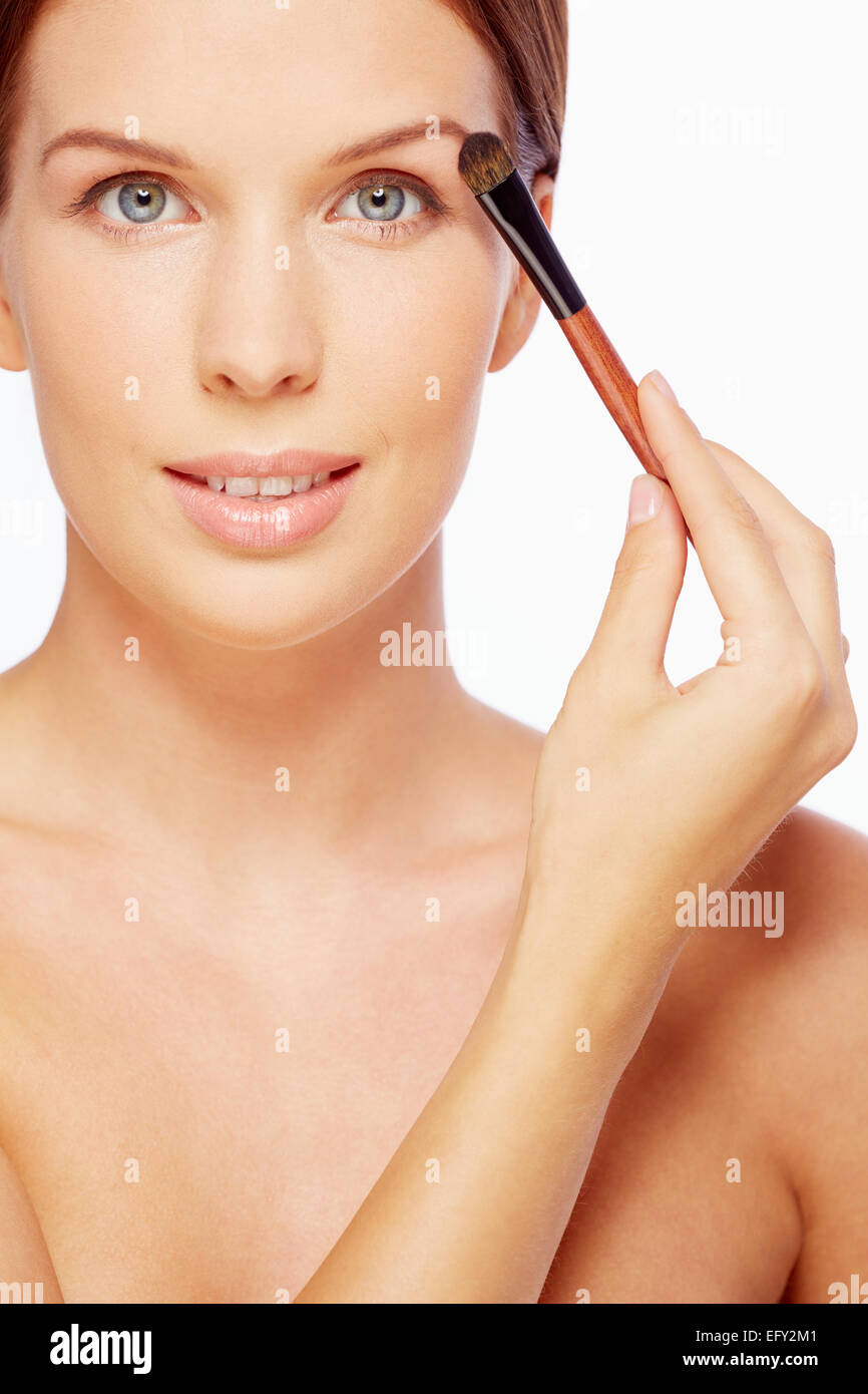 Woman applying eyeshadow on eyelid hi-res stock photography and images - Alamy