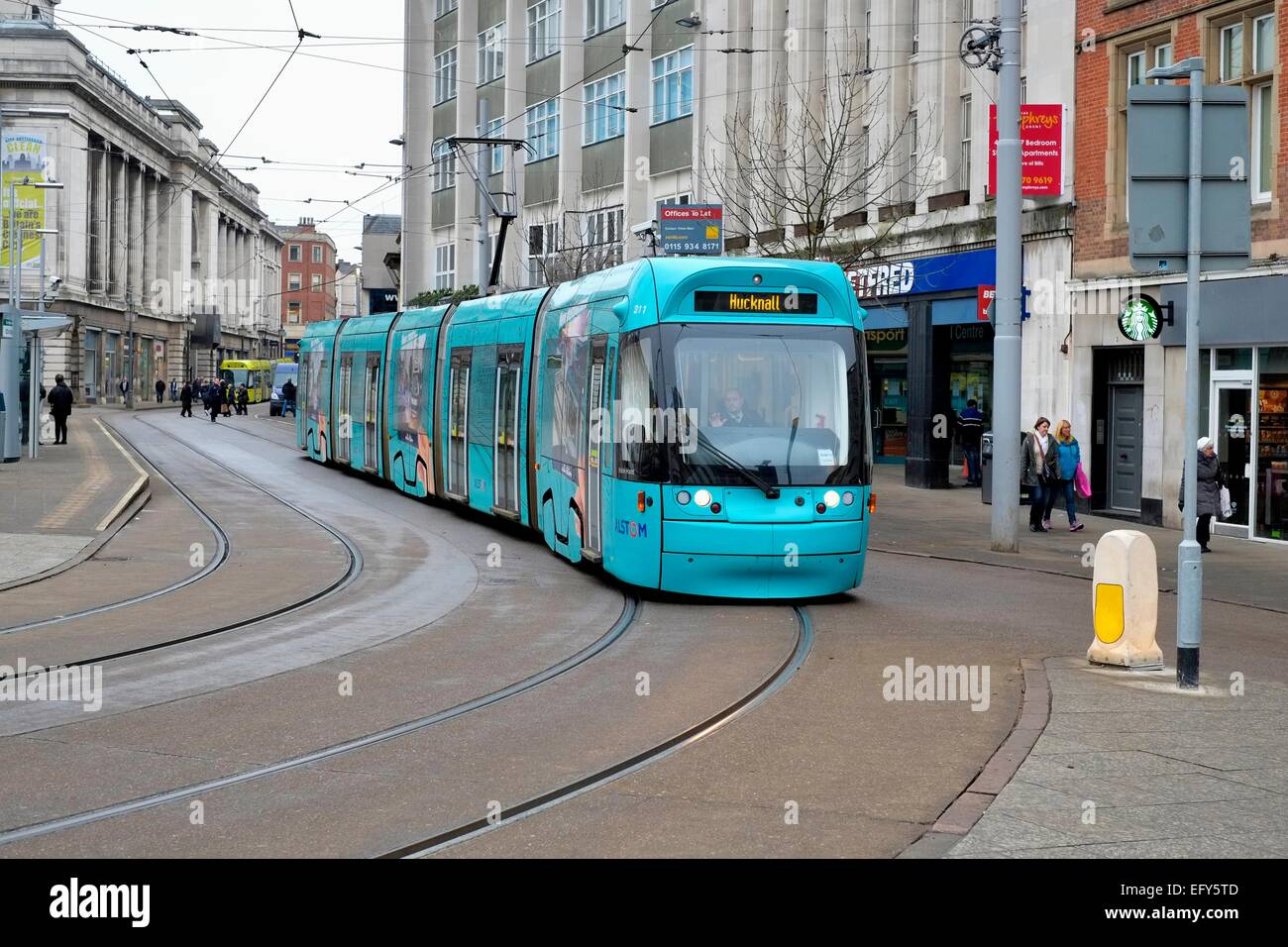 Blue painted Tram in the old market square Nottingham city centre ...