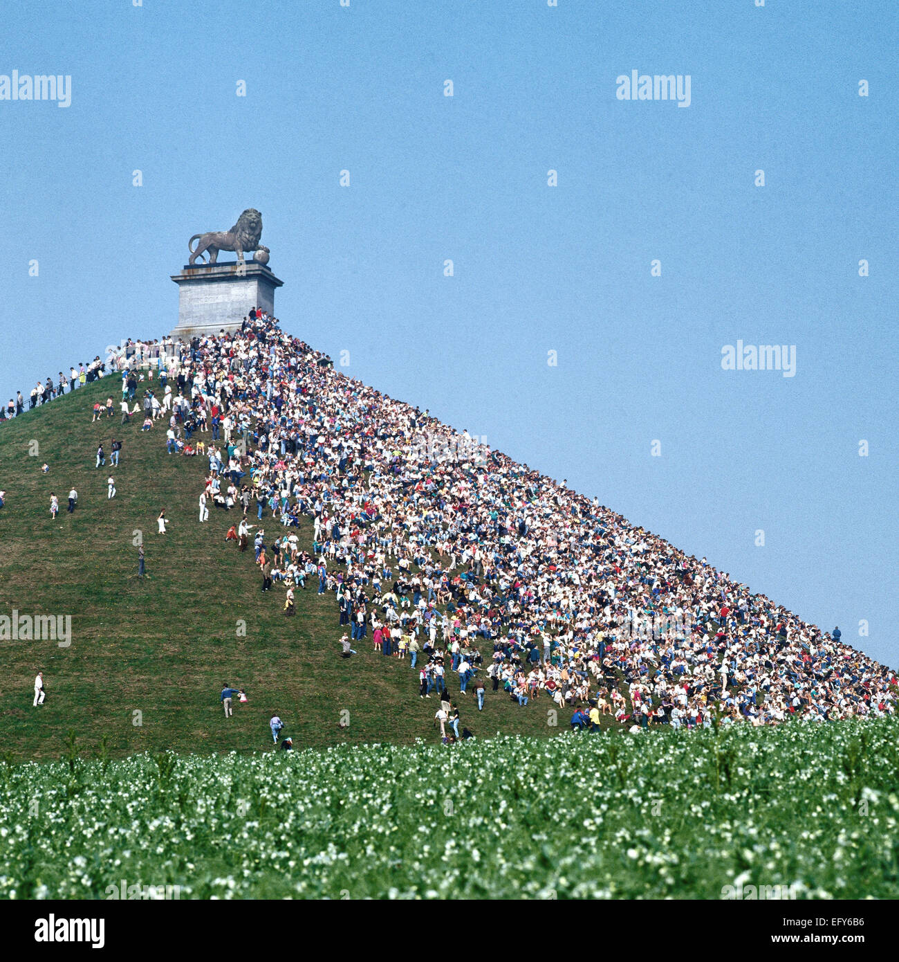 WATERLOO, BELGIUM -CIRCA 1990: Public holds the famous Lion memorial ...