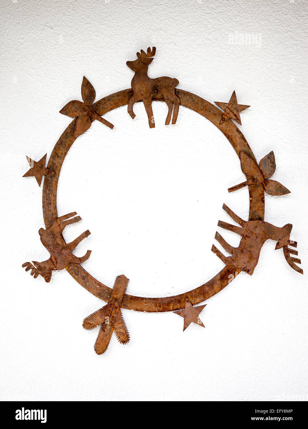 Rusty iron wreath with deer, stars and leaves Stock Photo - Alamy