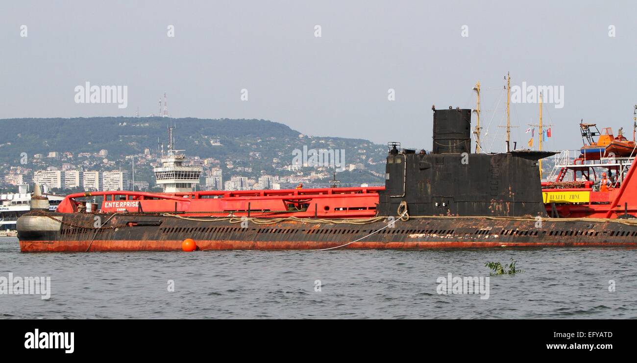 A tugboat pulls a Russian-made Bulgarian submarine, the Nadezhda (Hope ...