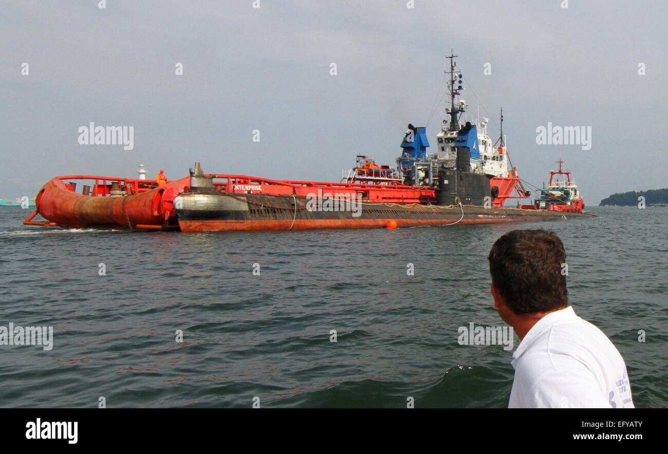 A tugboat pulls a Russian-made Bulgarian submarine, the Nadezhda (Hope ...