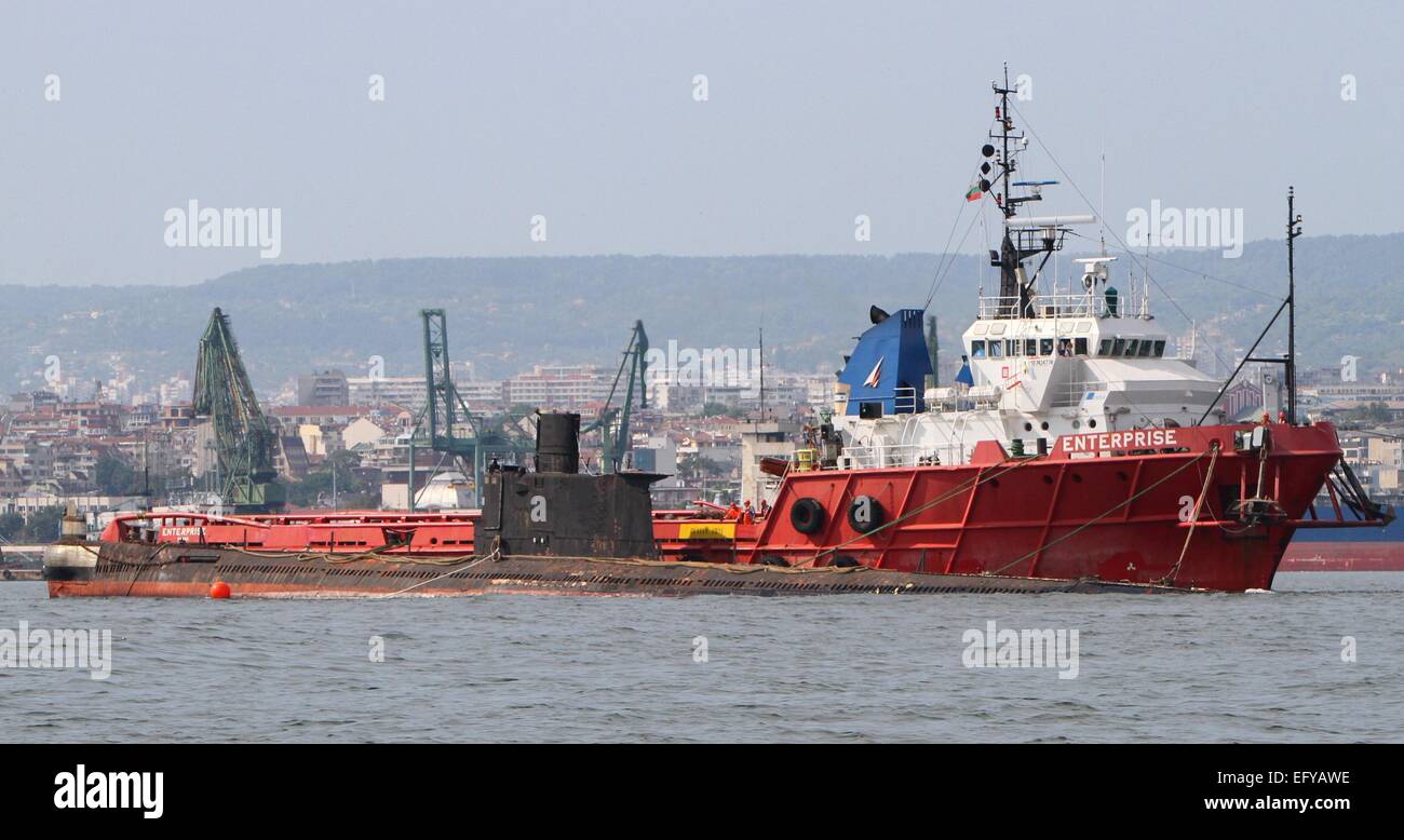 A tugboat pulls a Russian-made Bulgarian submarine, the Nadezhda (Hope ...