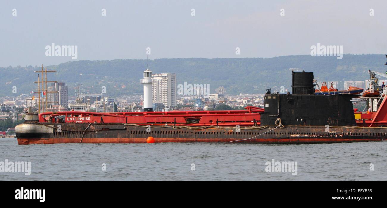 A tugboat pulls a Russian-made Bulgarian submarine, the Nadezhda (Hope ...