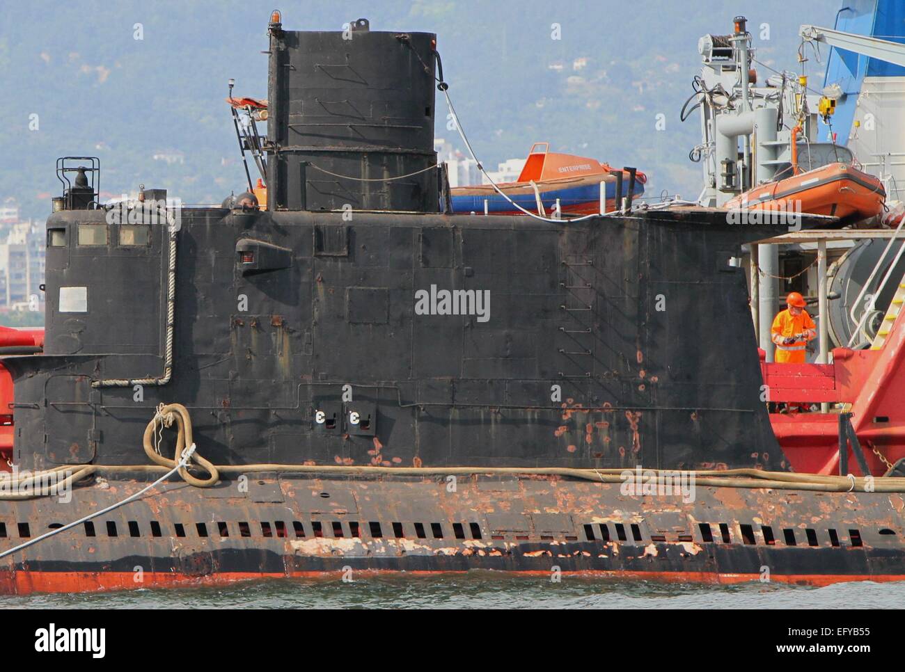 A tugboat pulls a Russian-made Bulgarian submarine, the Nadezhda (Hope ...