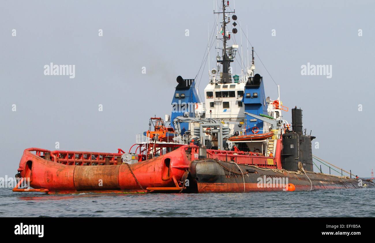 A tugboat pulls a Russian-made Bulgarian submarine, the Nadezhda (Hope ...