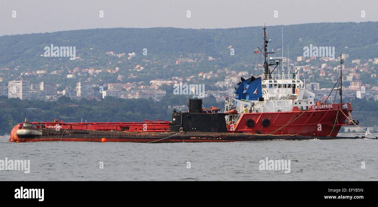 A tugboat pulls a Russian-made Bulgarian submarine, the Nadezhda (Hope ...