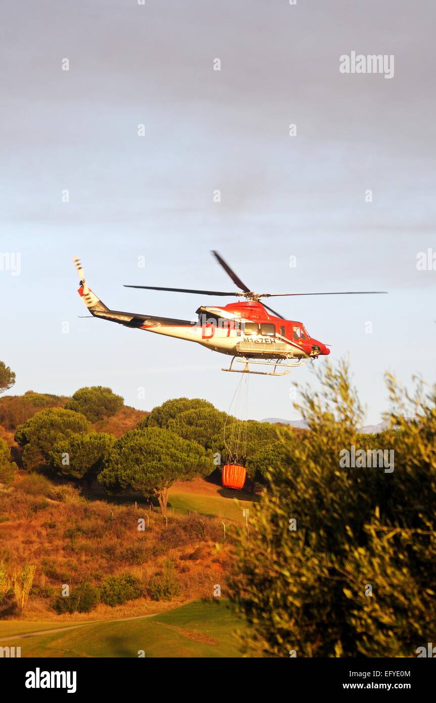 Dangling from helicopter hi-res stock photography and images - Alamy