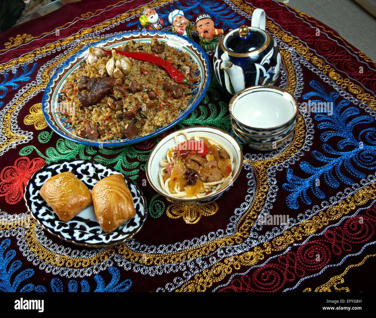 food set Central Asian cuisine - plov, lagman,sherbet and samsa Stock ...