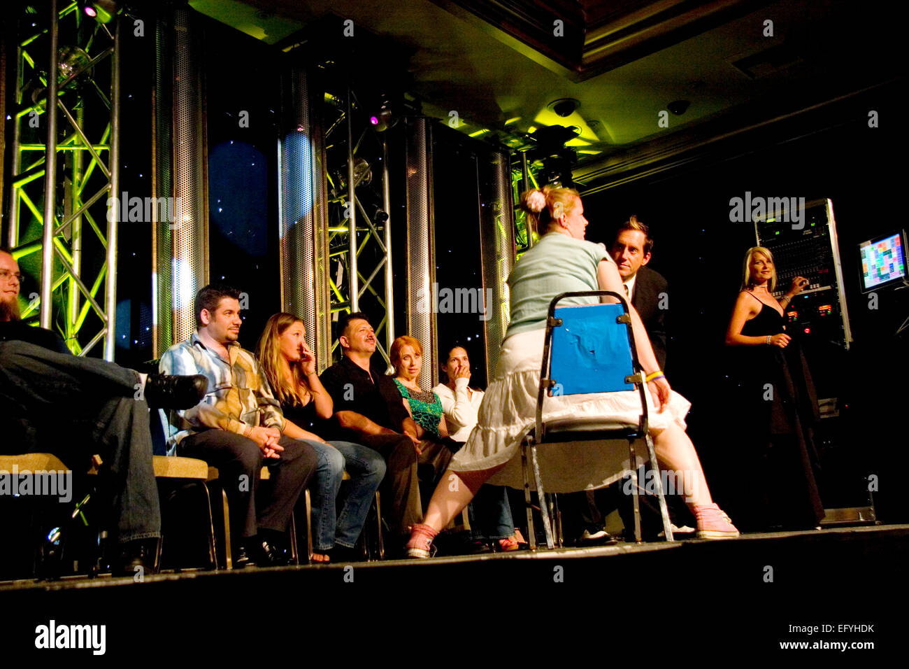 Anthony Cools hypnotizes members of the audience at his comedic ...