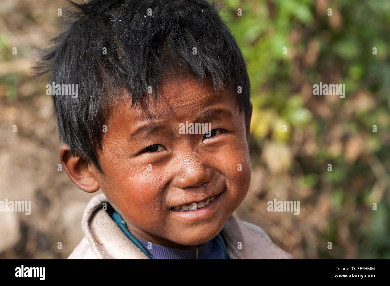 Nepalese boy smiling hi-res stock photography and images - Alamy