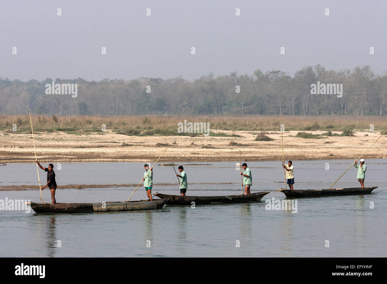 3 men boat river hi-res stock photography and images - Alamy