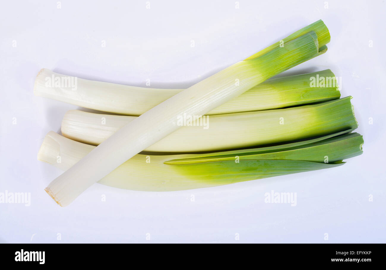 bunch of leeks isolated on a white background Stock Photo - Alamy