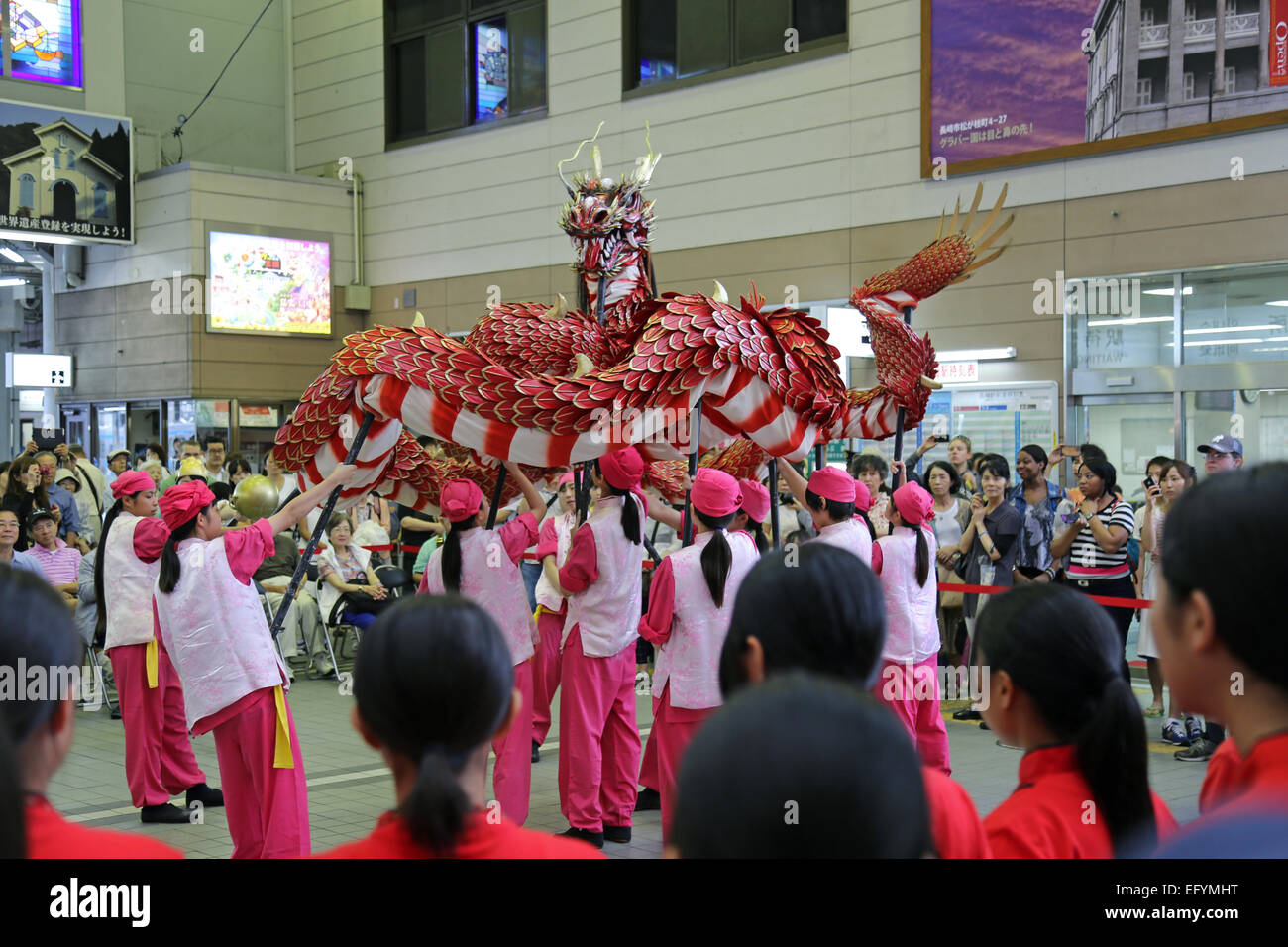 Japanese high school girls performing a Chinese Dragon Dance ceremony ...